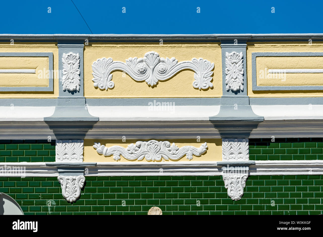 details of a frieze on an old house in the city of Olhao, Algarve ...