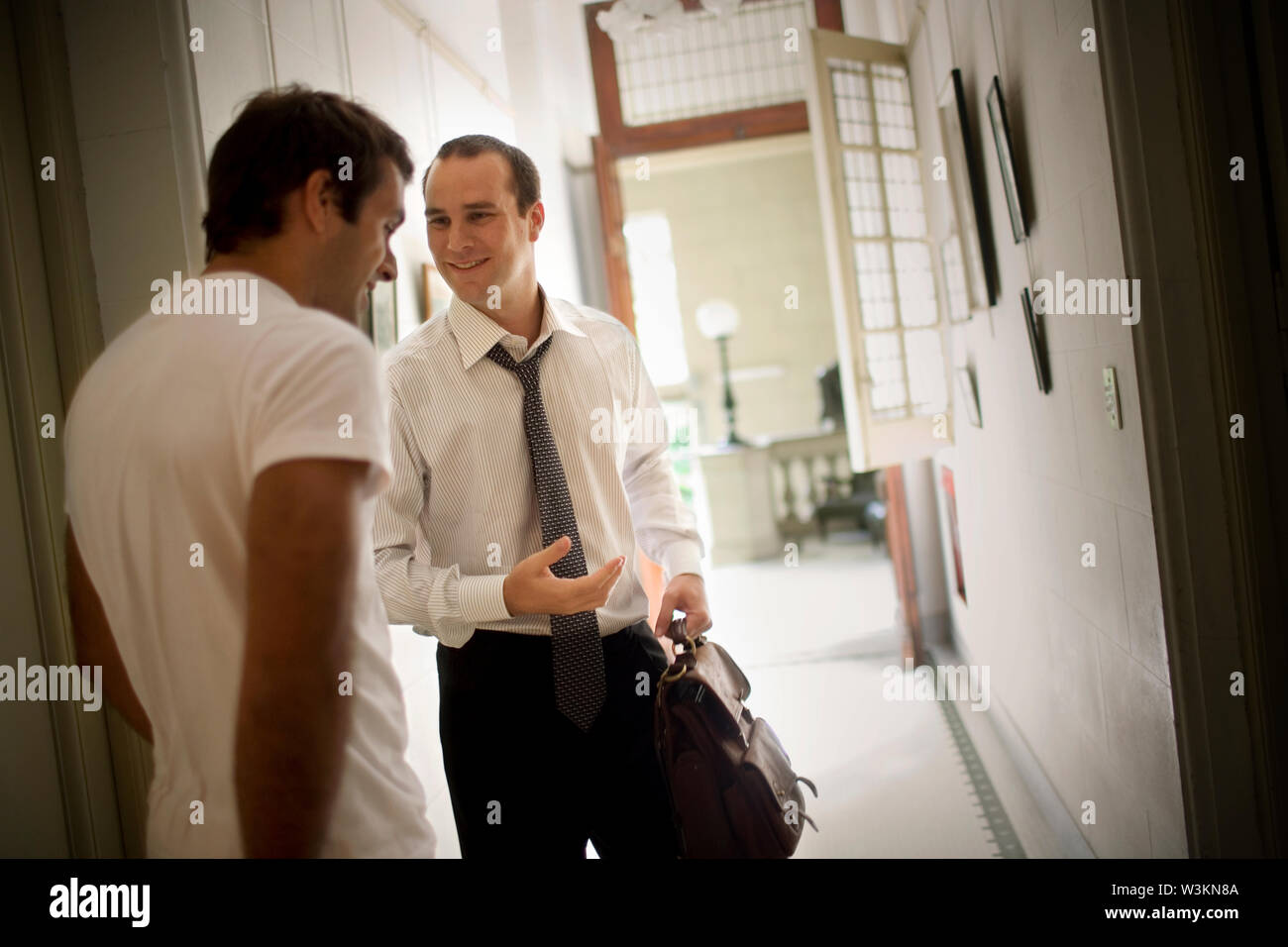 Two young brothers talking hi-res stock photography and images - Alamy