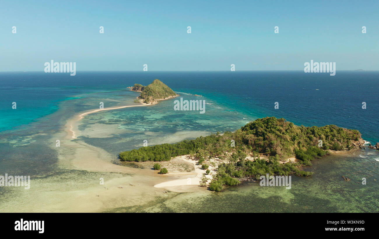 Aerial drone tropical island in blue lagoon with sand bar. Palawan ...