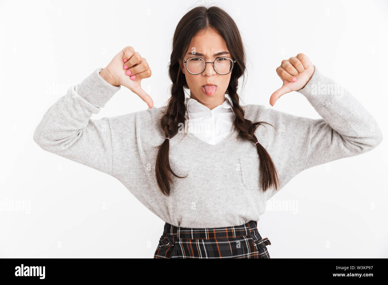 Photo closeup of confused teenage girl wearing eyeglasses and school ...
