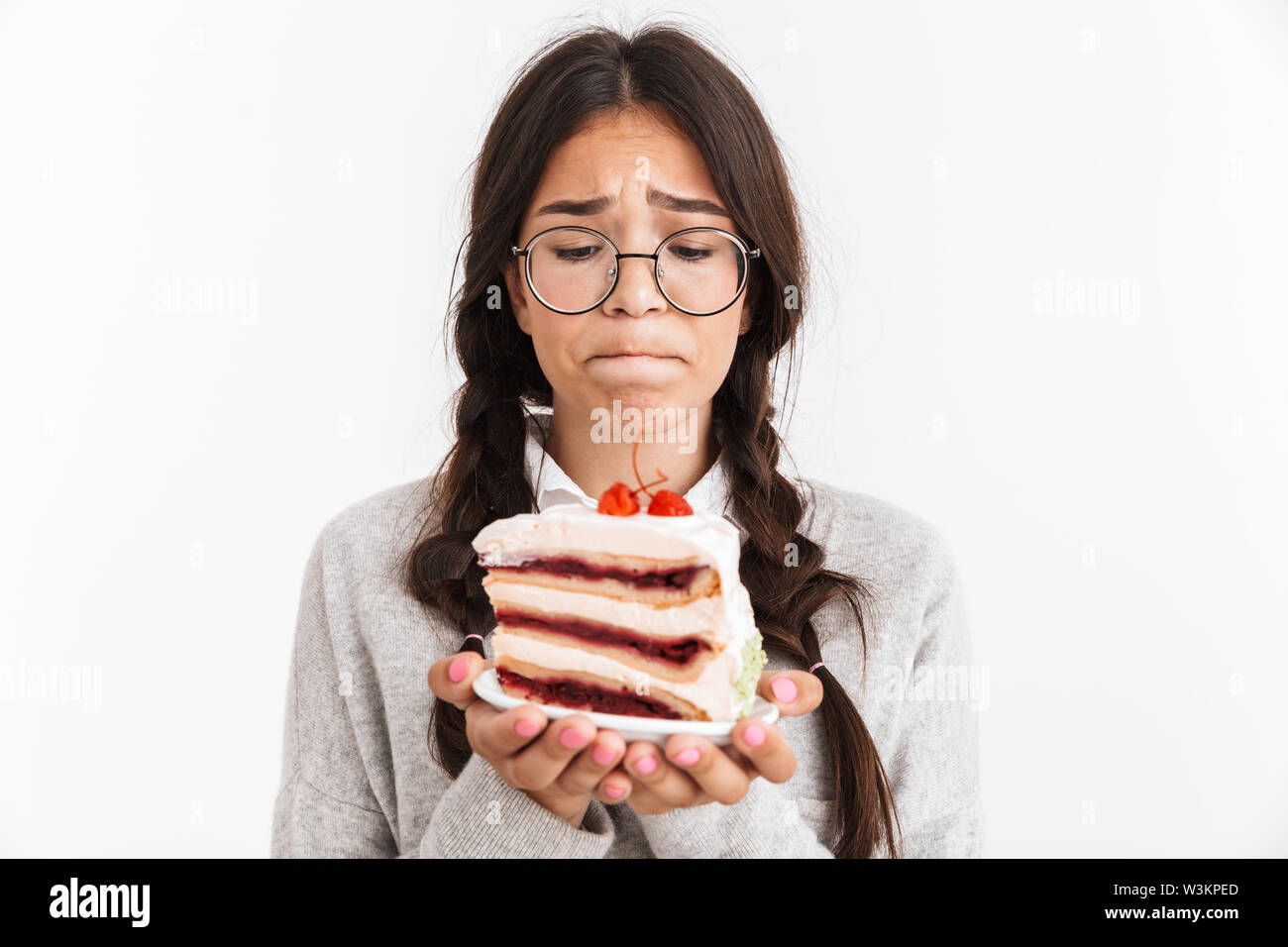 Photo closeup of confused teenage girl wearing eyeglasses feeling sad ...