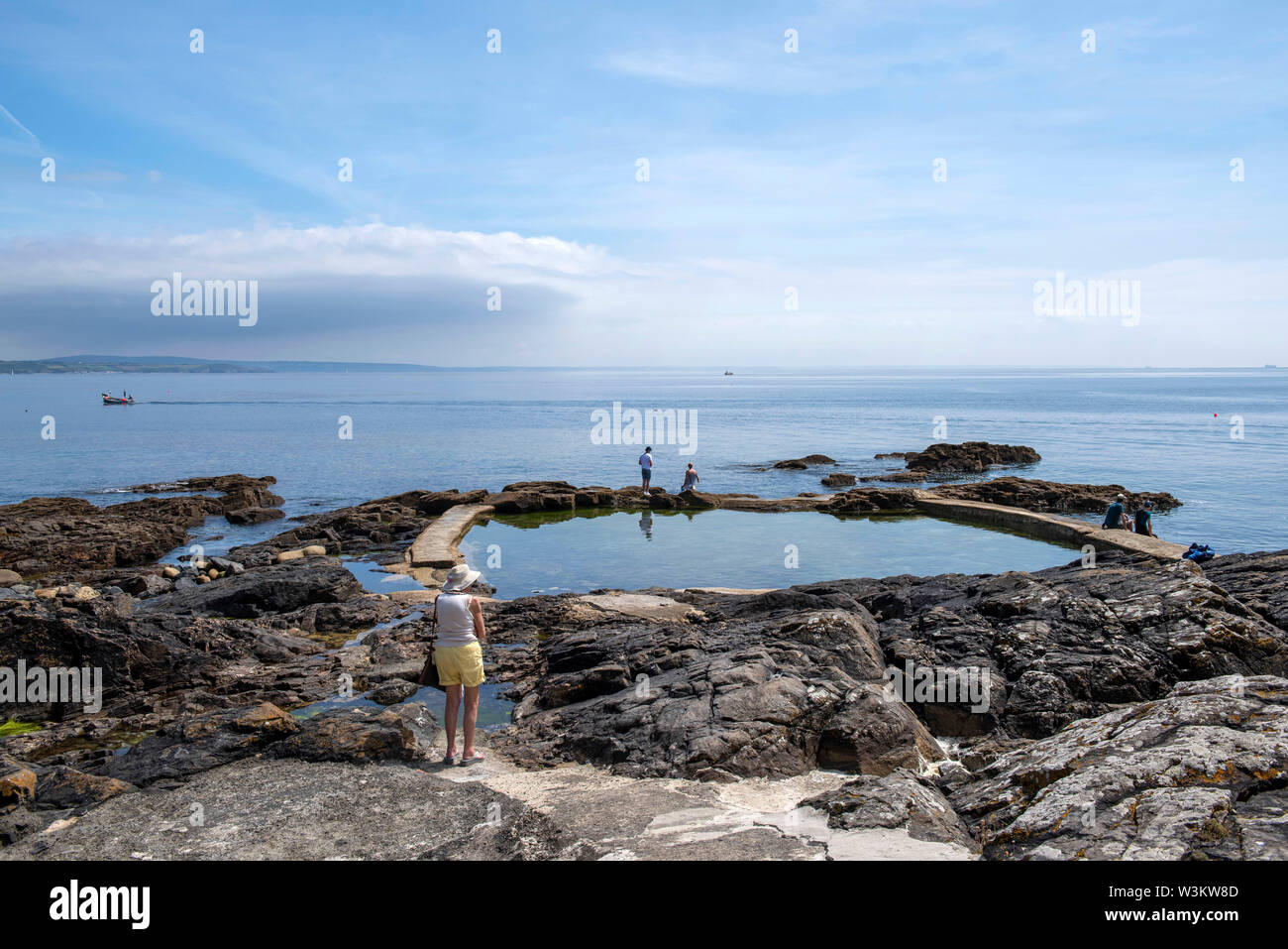 A sunny summer day at the Rock Pool in Mousehole, Cornwall England UK ...