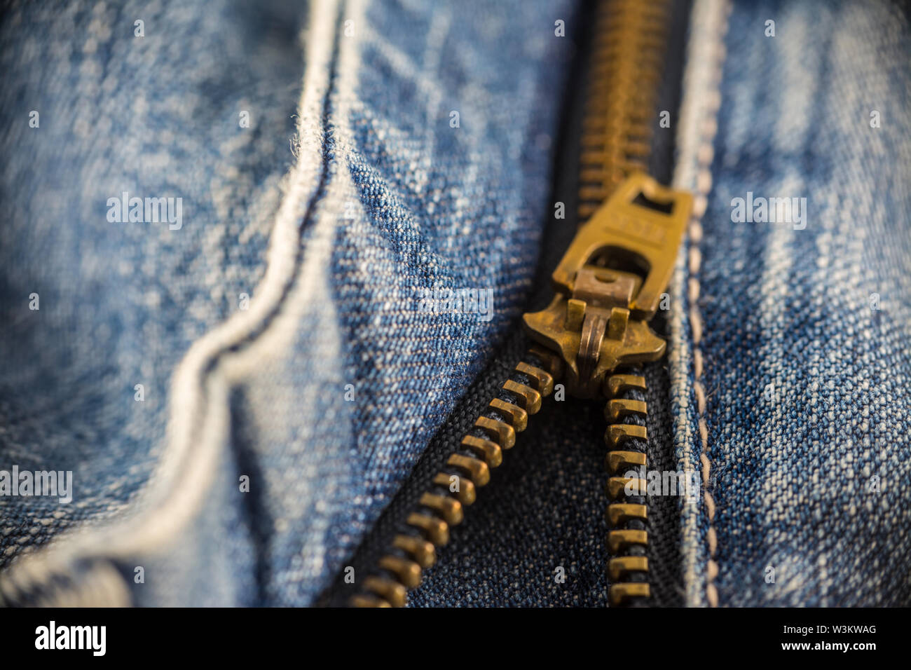 Jeans button and zipper hi-res stock photography and images - Alamy