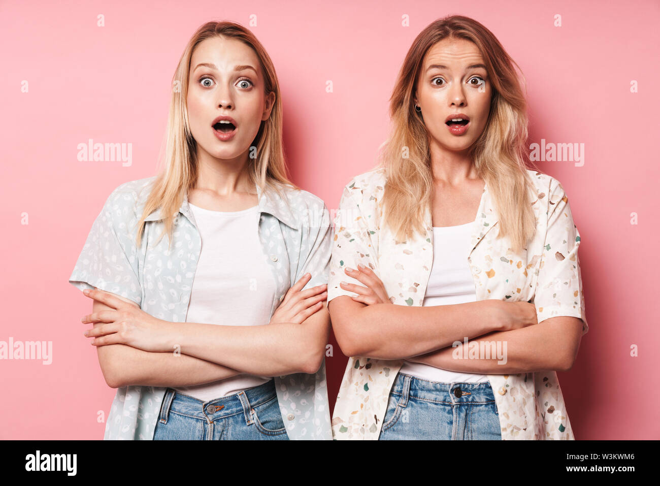 Image of emotional shocked pretty blondes women friends posing isolated ...
