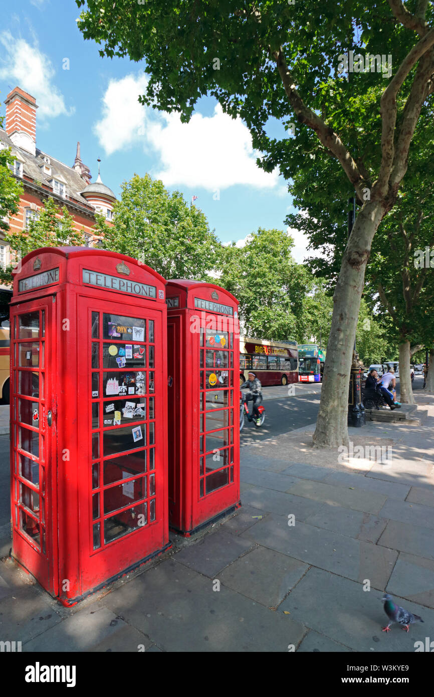 Two iconic red telephone boxes on the Victoria Embankment in London ...