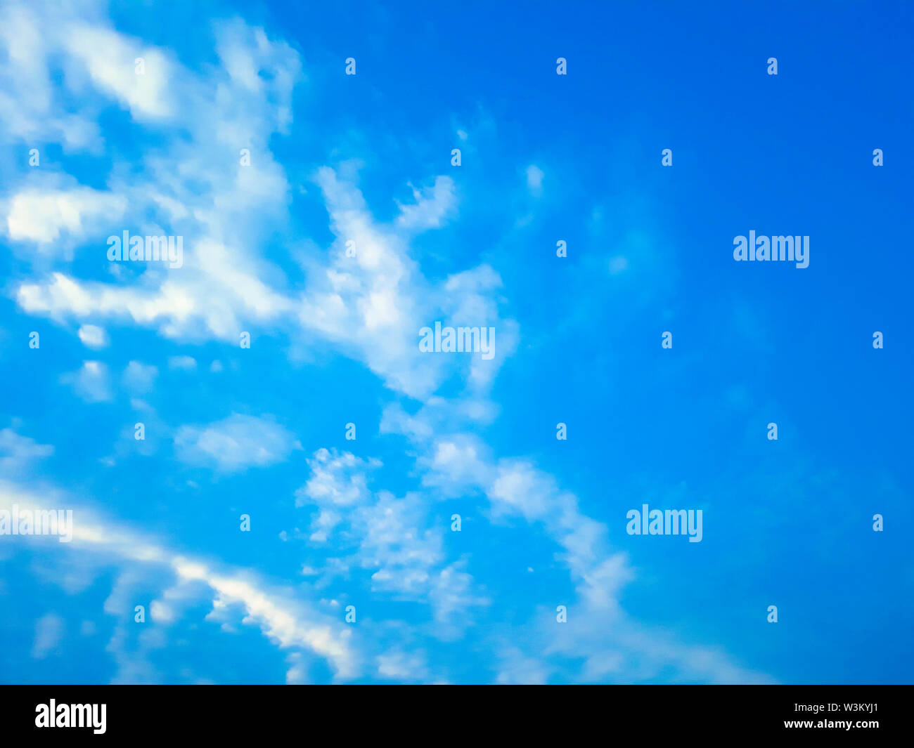 Beautiful white clouds on blue sky with tiny clouds Stock Photo - Alamy