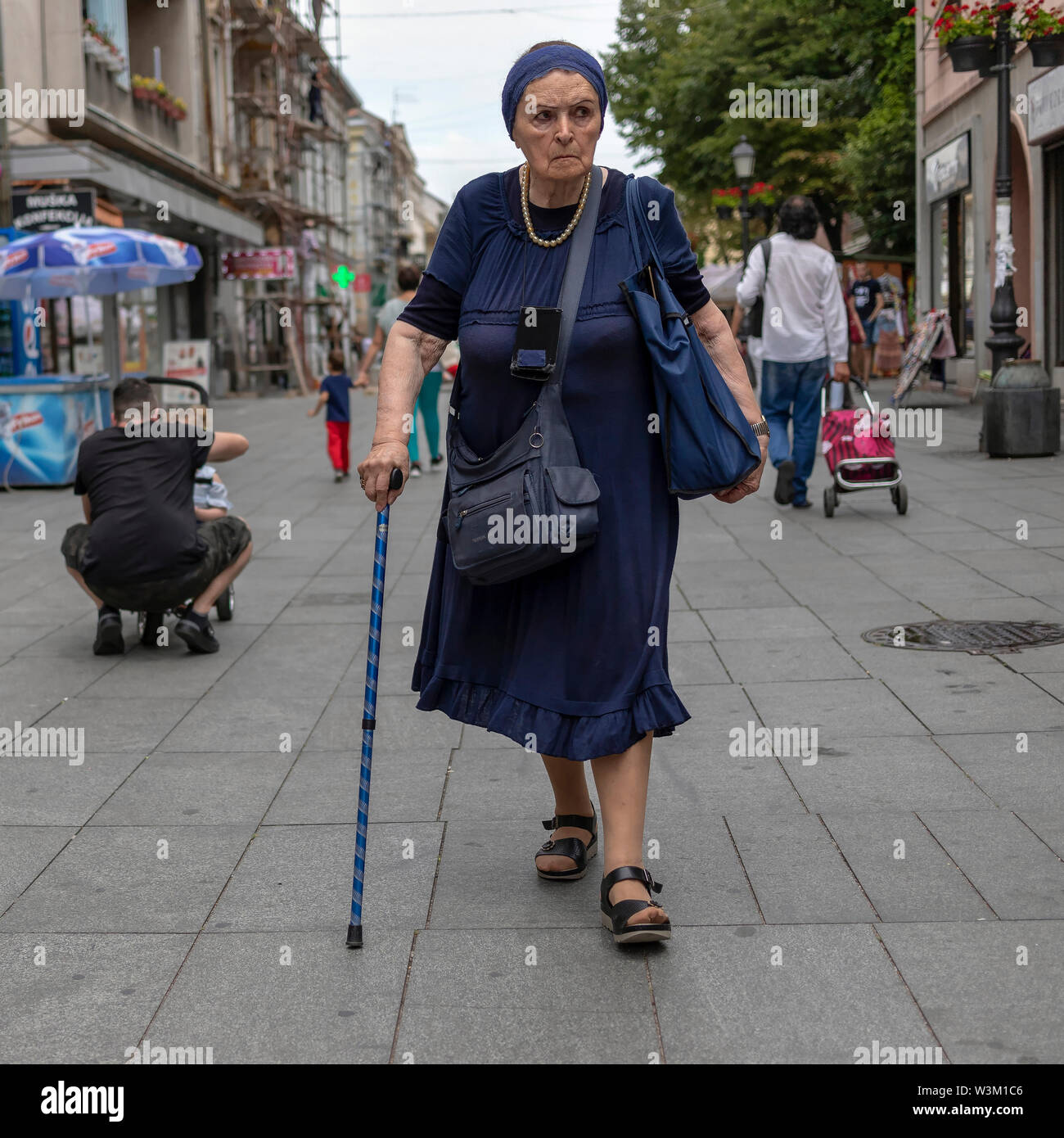 Old Woman Using A Walking Stick High Resolution Stock Photography and ...