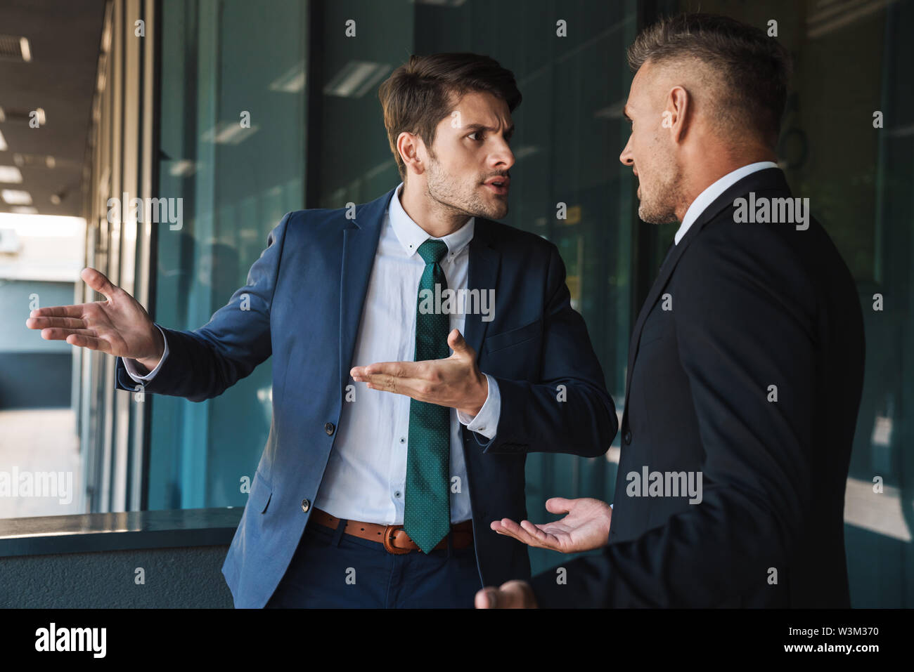 Two men fight suit hi-res stock photography and images - Alamy