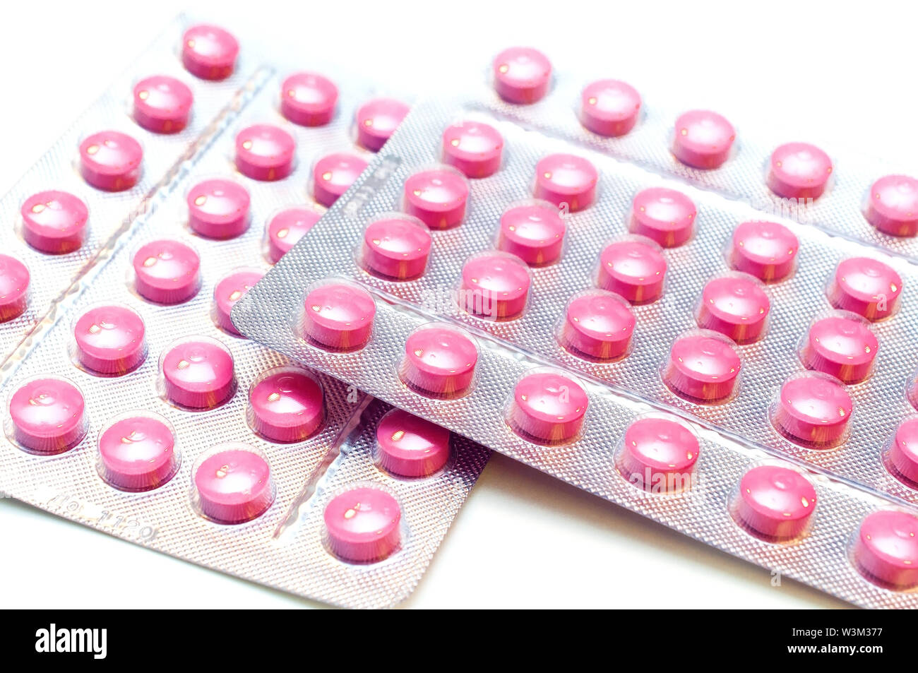 Color pills for the treatment of disease. Pharmaceutical tablets Stock ...