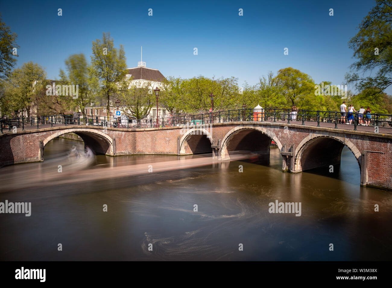 Four famous bridges over the canals of Amsterdam, Holland Stock Photo ...