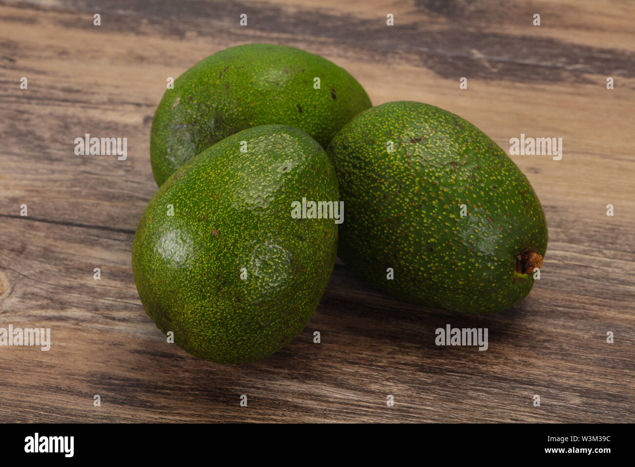 Ripe green dietary avocado - superfood for vegan Stock Photo - Alamy