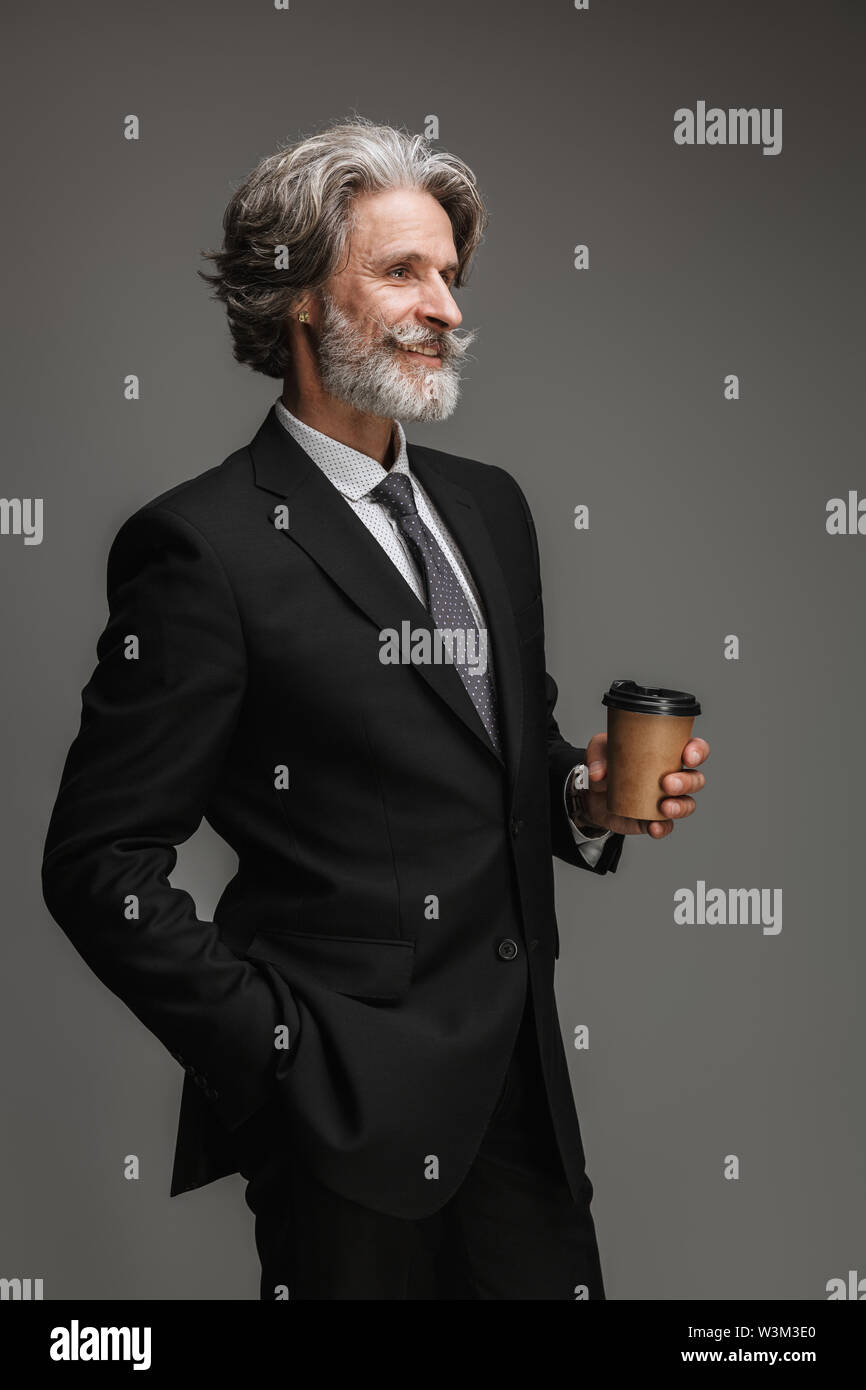Image of adult professor man wearing formal black suit smiling and ...