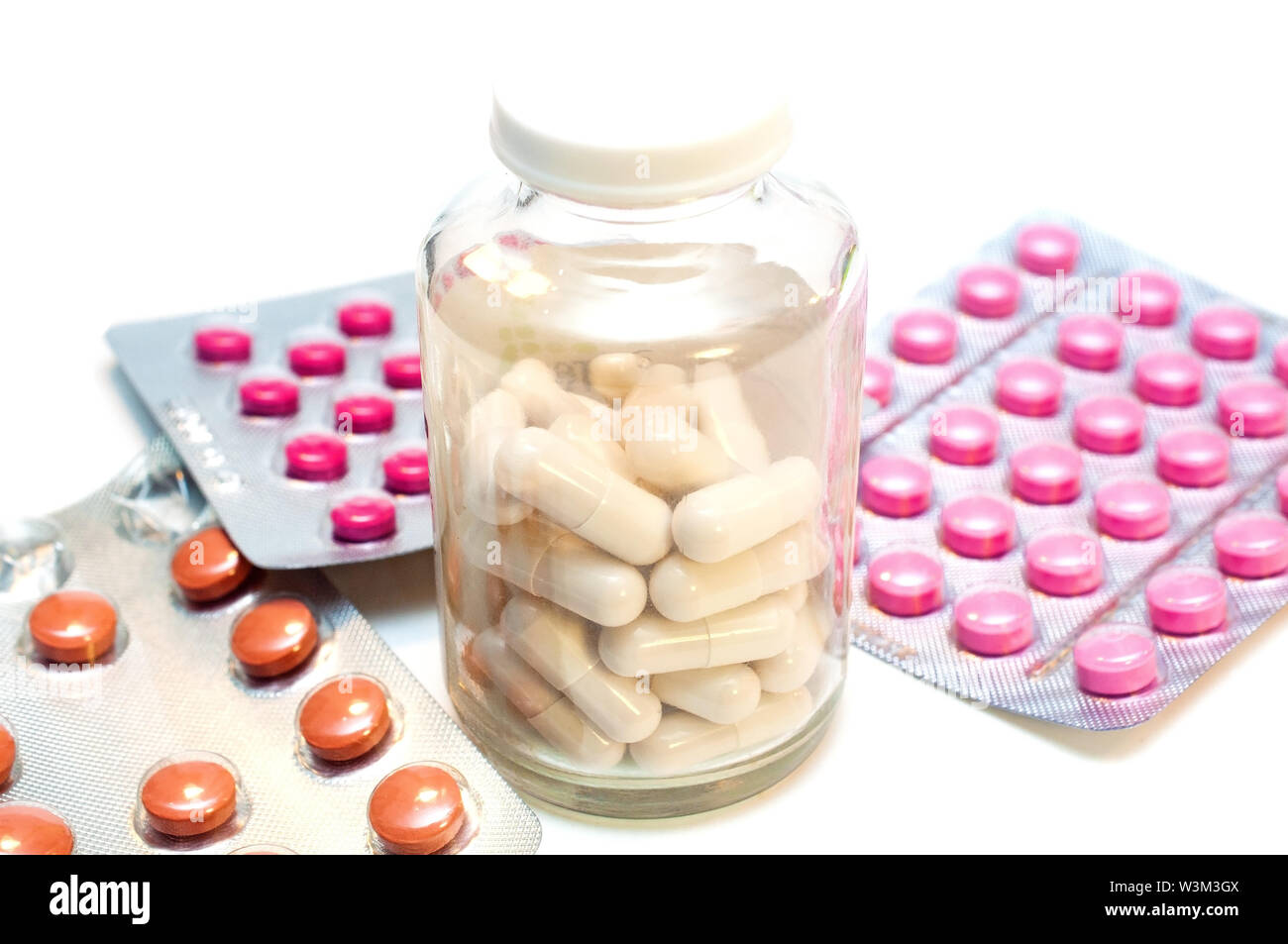 Color pills for the treatment of disease. Pharmaceutical tablets Stock ...