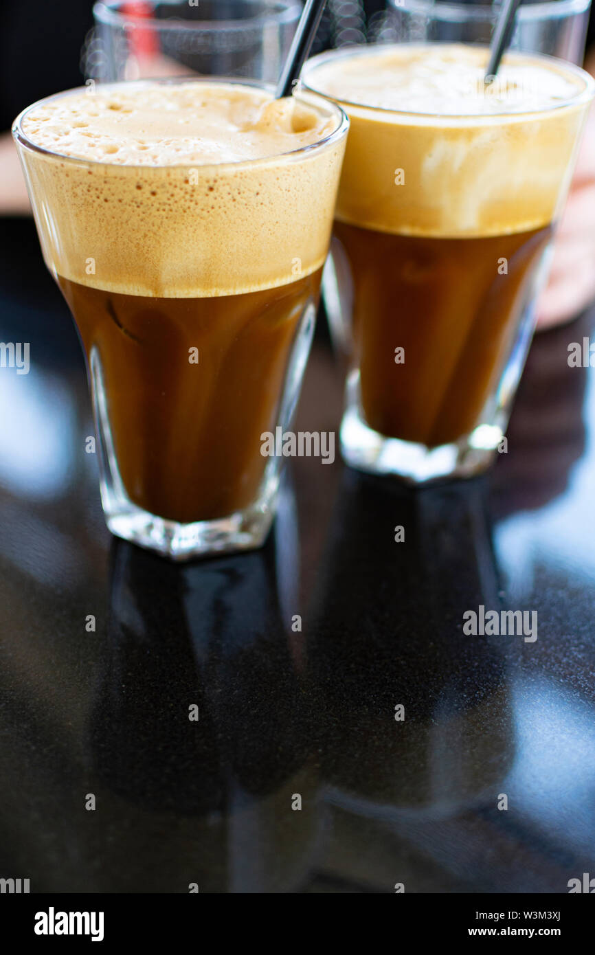 Traditional greek cold coffee Frappe with foam made from water, instant ...