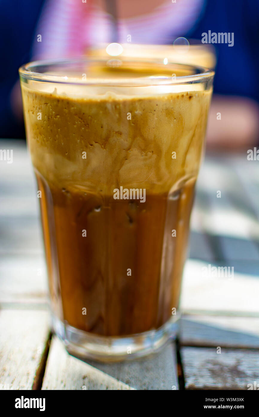 Traditional greek cold coffee Frappe with foam made from water, instant ...