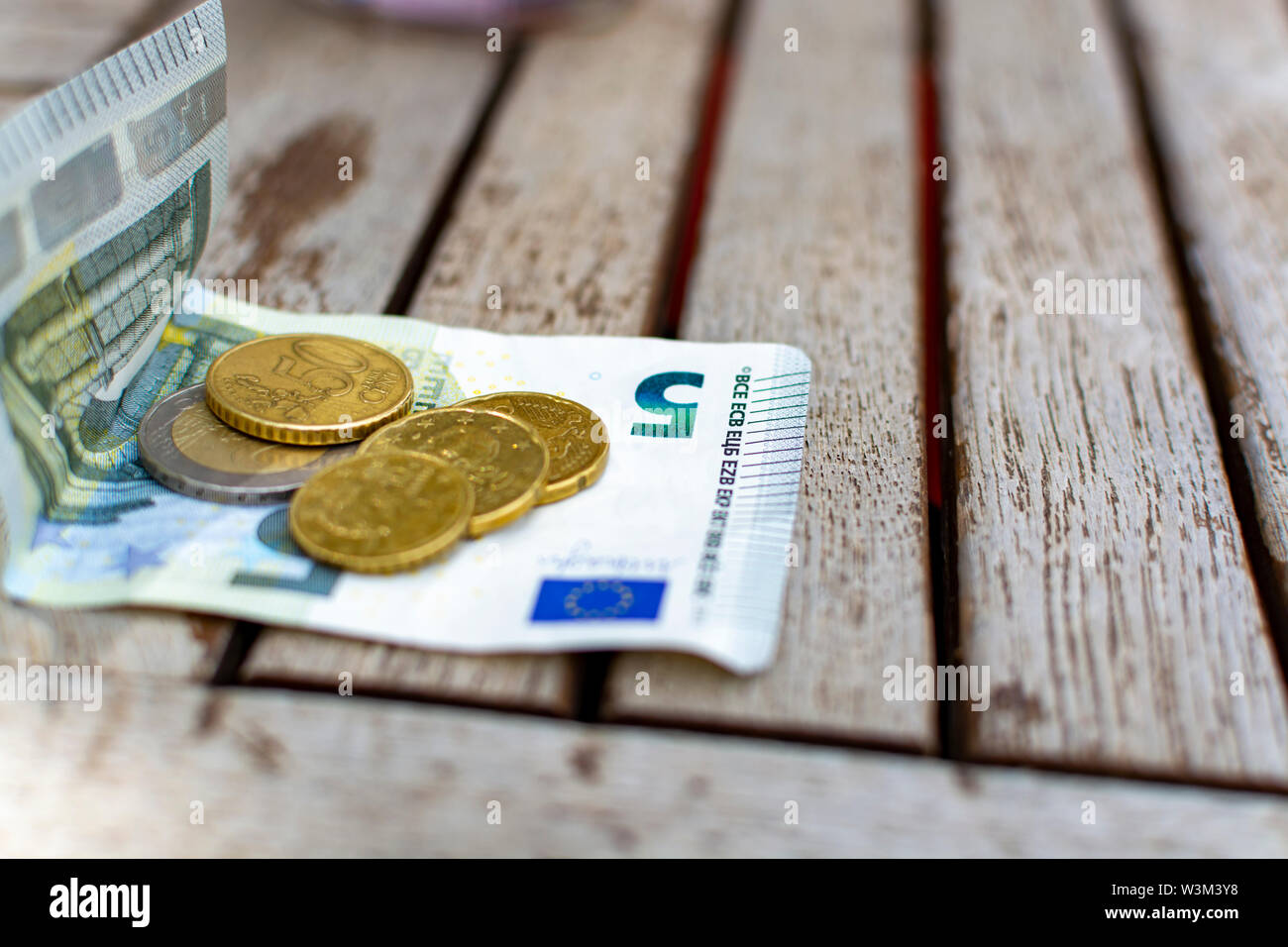 Bill or receipt payment in outdoor cafe in Euro cash, banknote and ...