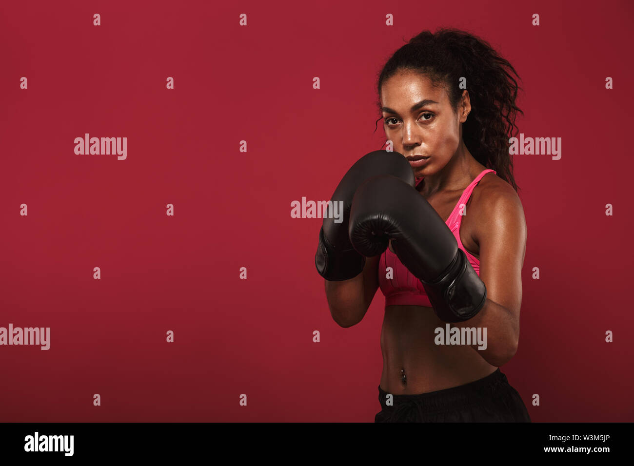 Image of amazing young african sports woman boxer posing isolated over ...