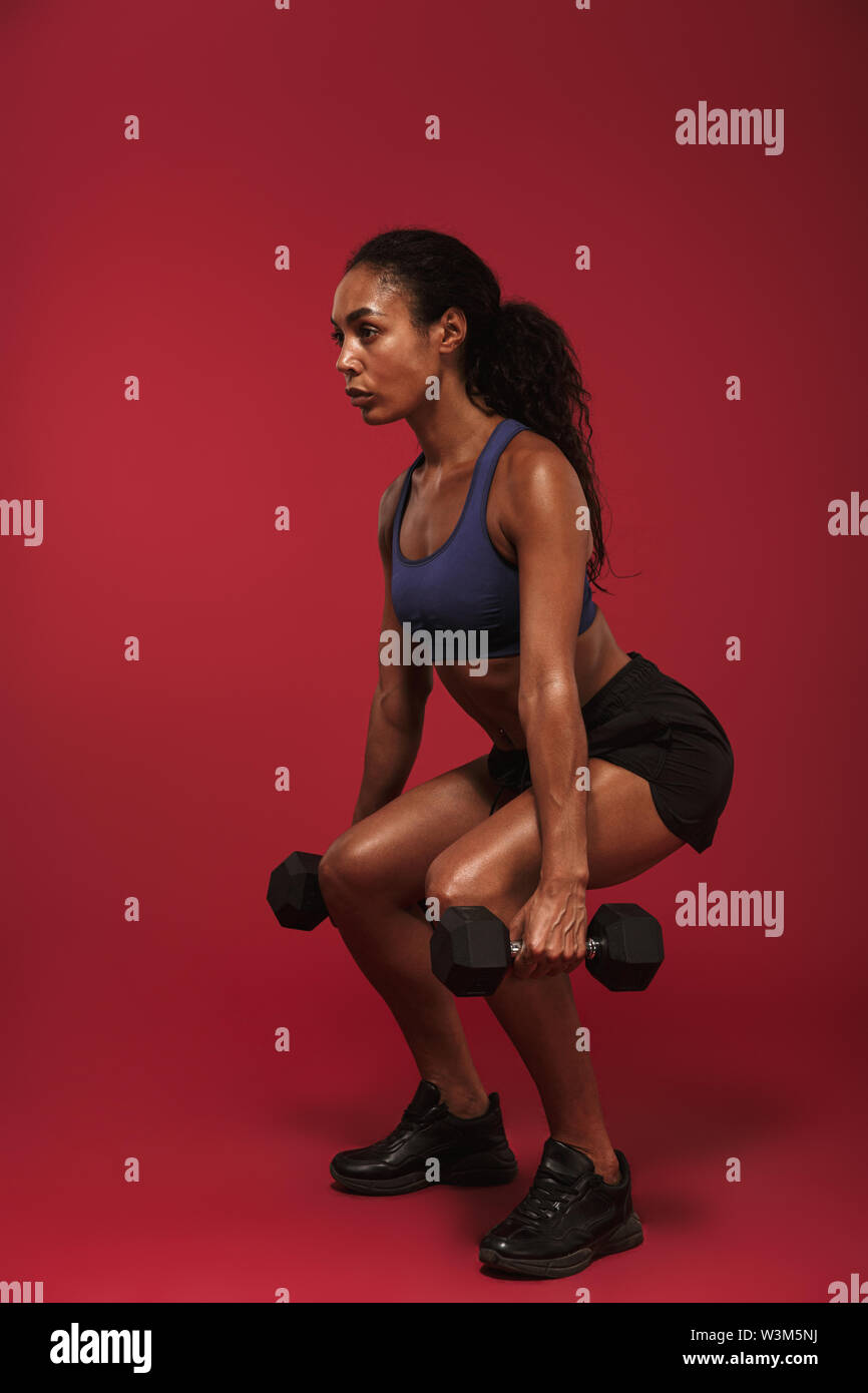 Image of a serious amazing strong young african fitness sports woman ...