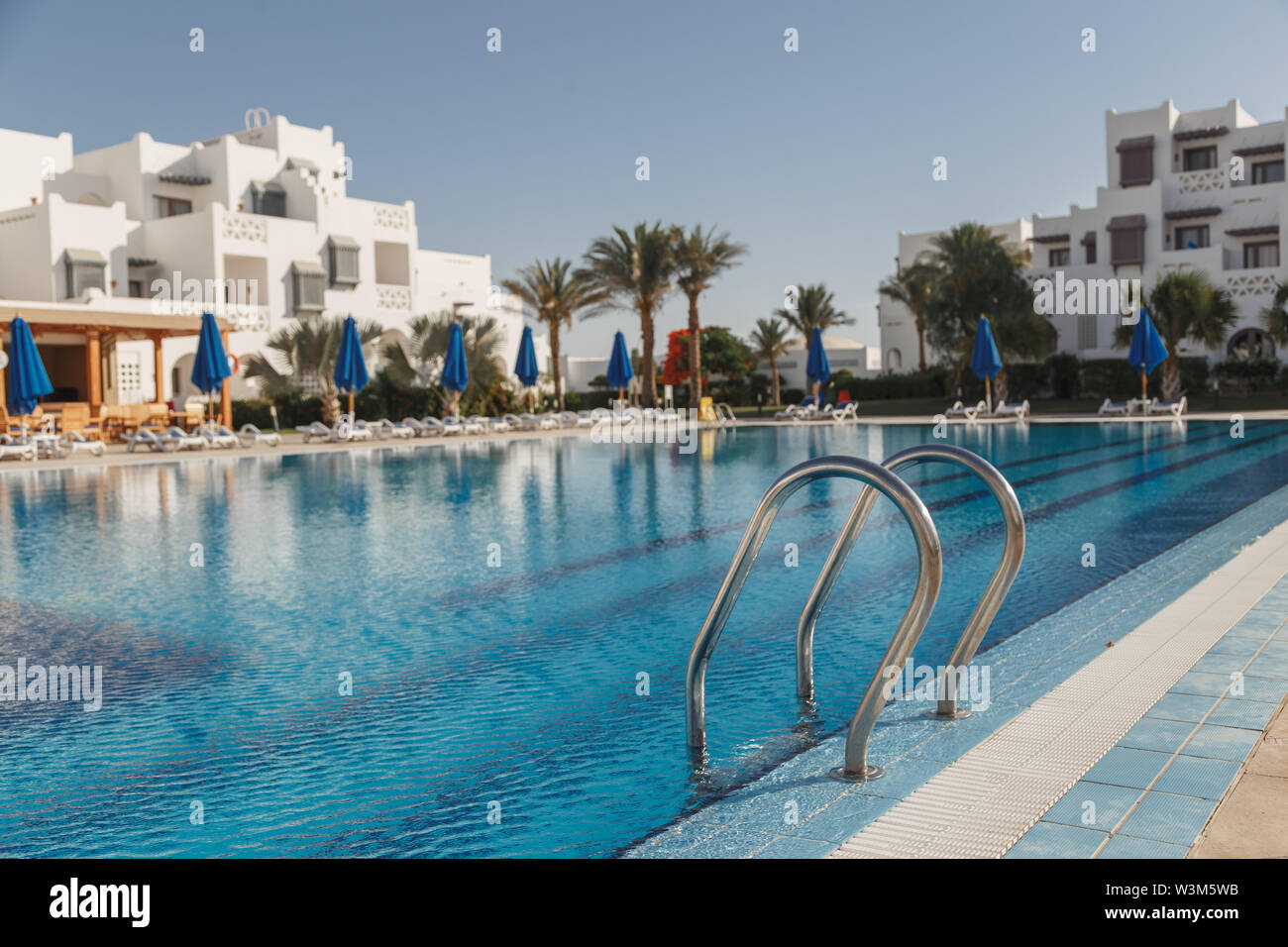 Swim Pool at tropical spa resort Stock Photo - Alamy