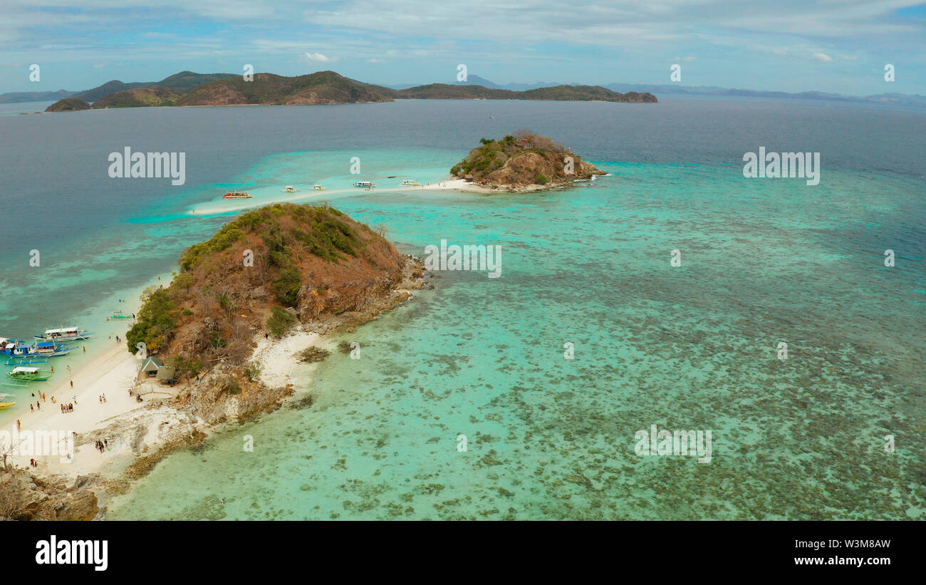 aerial view tropical island with sand white beach. Bulog Dos ...