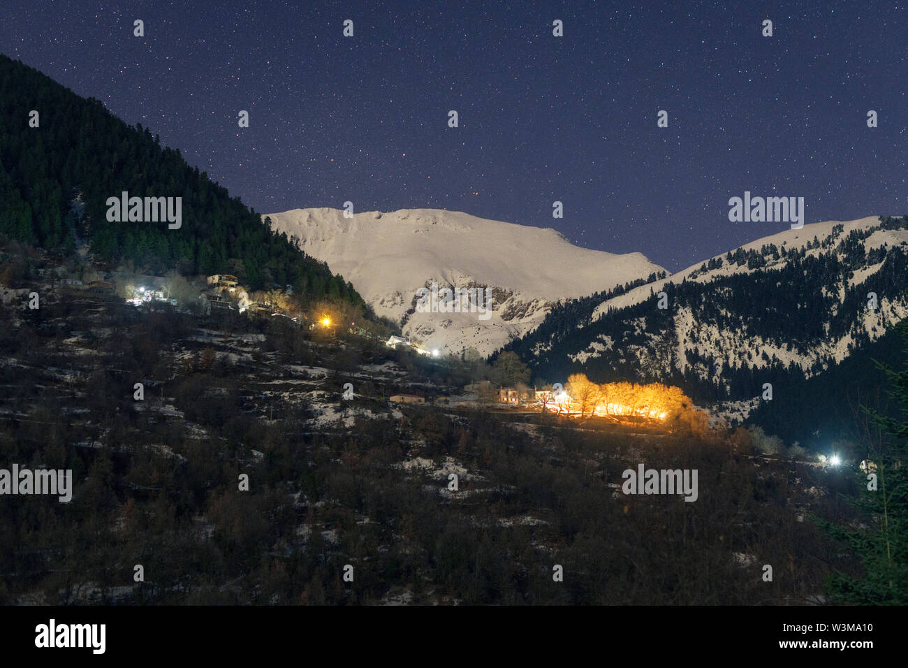 Majestic Night Sky Above The Snowy Agrafa Mountains Stock Photo - Alamy