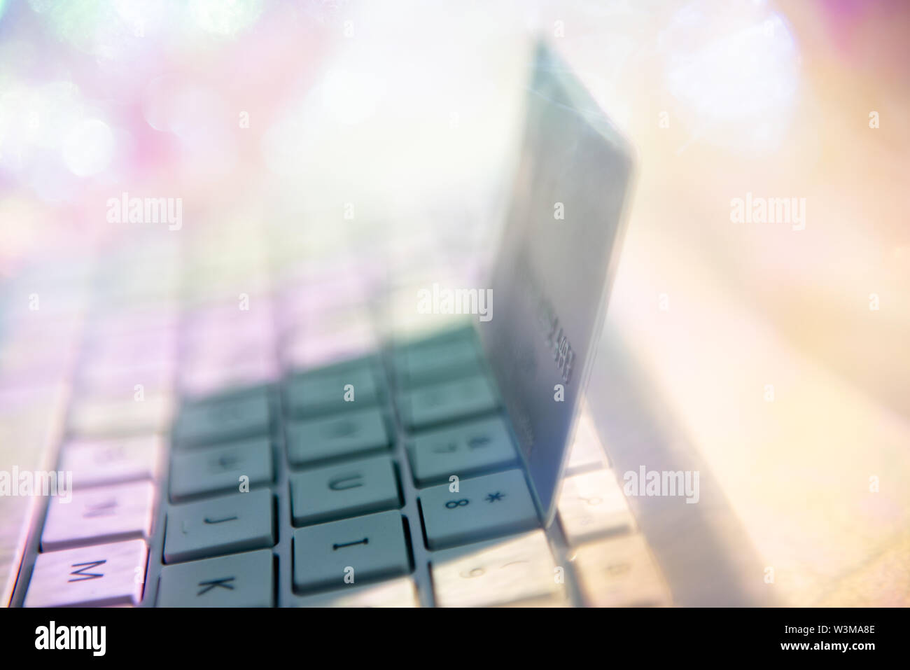 Credit card on computer keyboard Stock Photo - Alamy