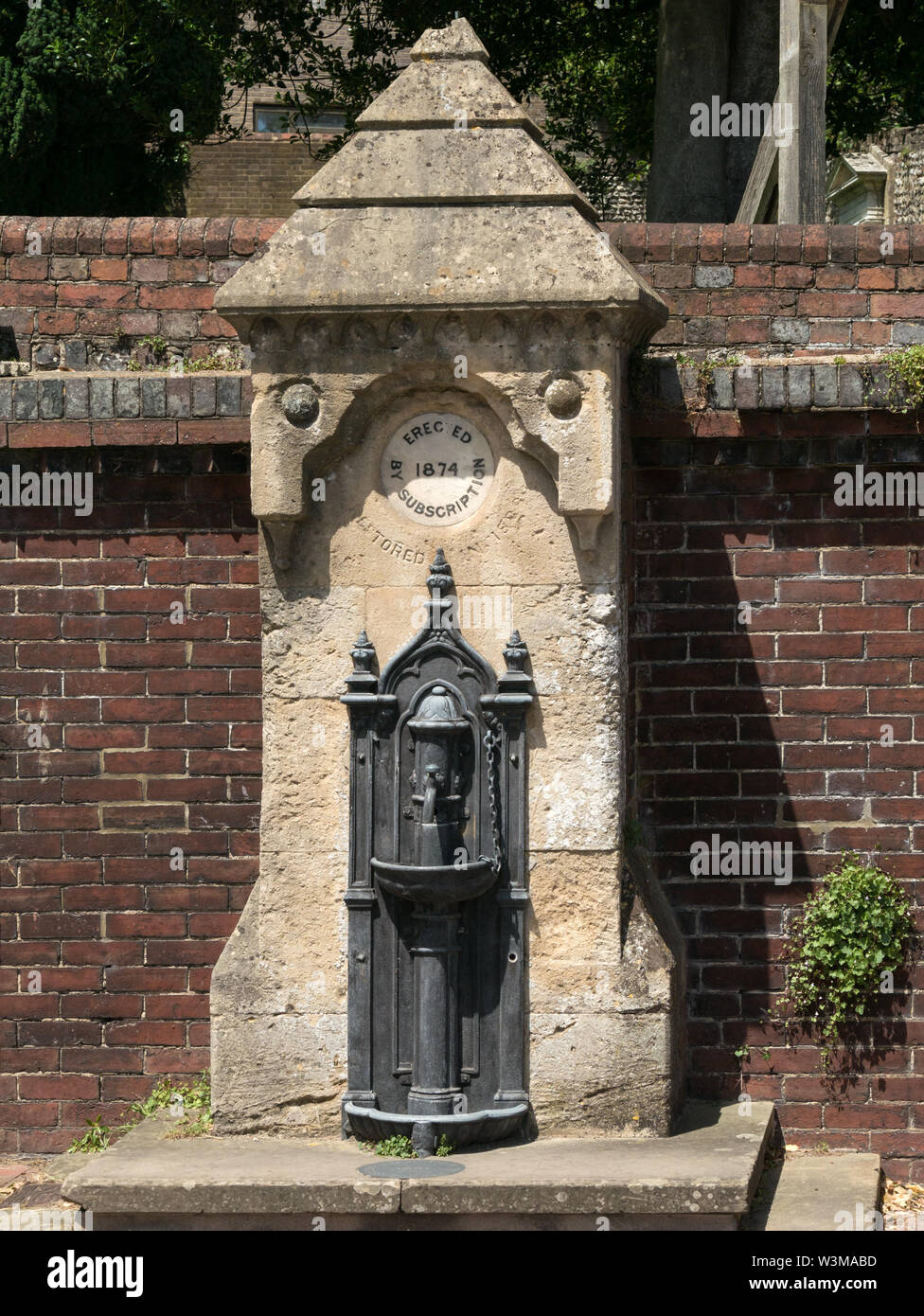 Old cast iron drinking water fountain and pump (dated 1874), Friars ...