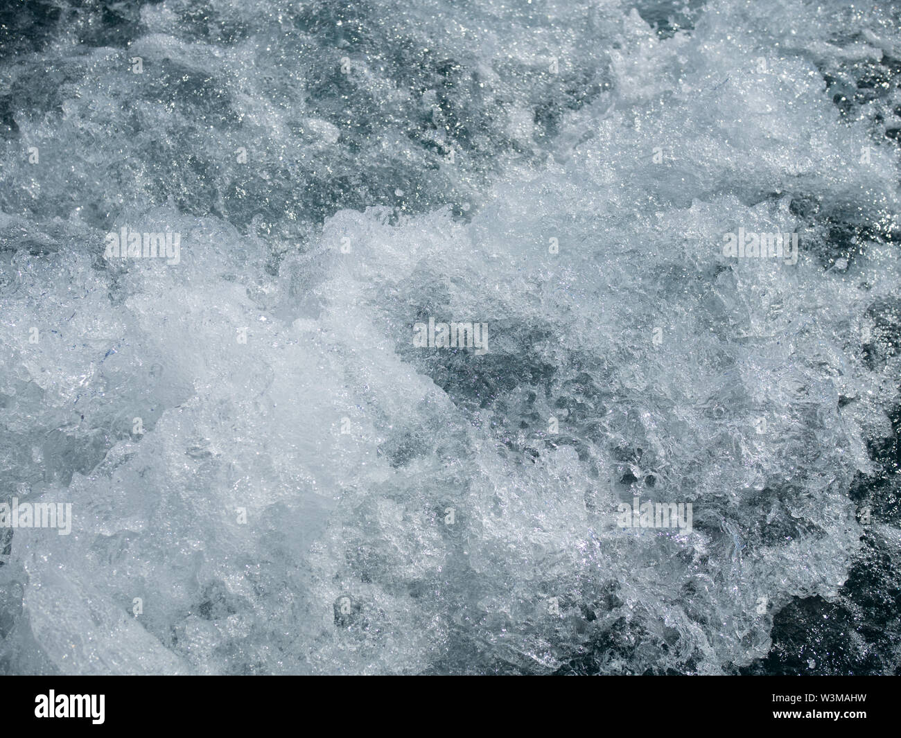 Simple blue end white water wave background Stock Photo - Alamy