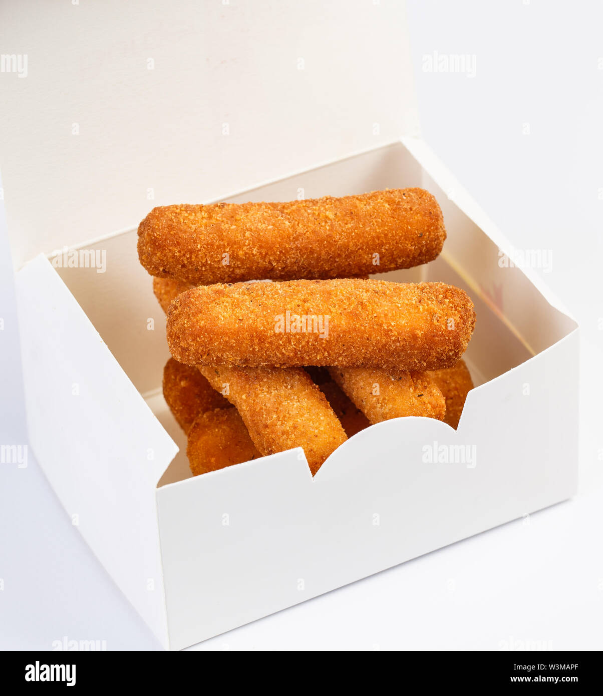 Fried cheese sticks in a white box Stock Photo - Alamy