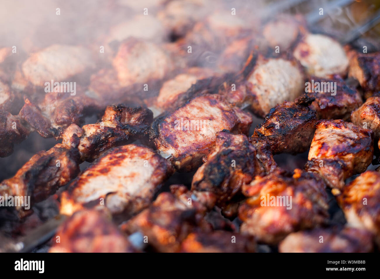 Beef and pork steak bbq on the grill Stock Photo - Alamy