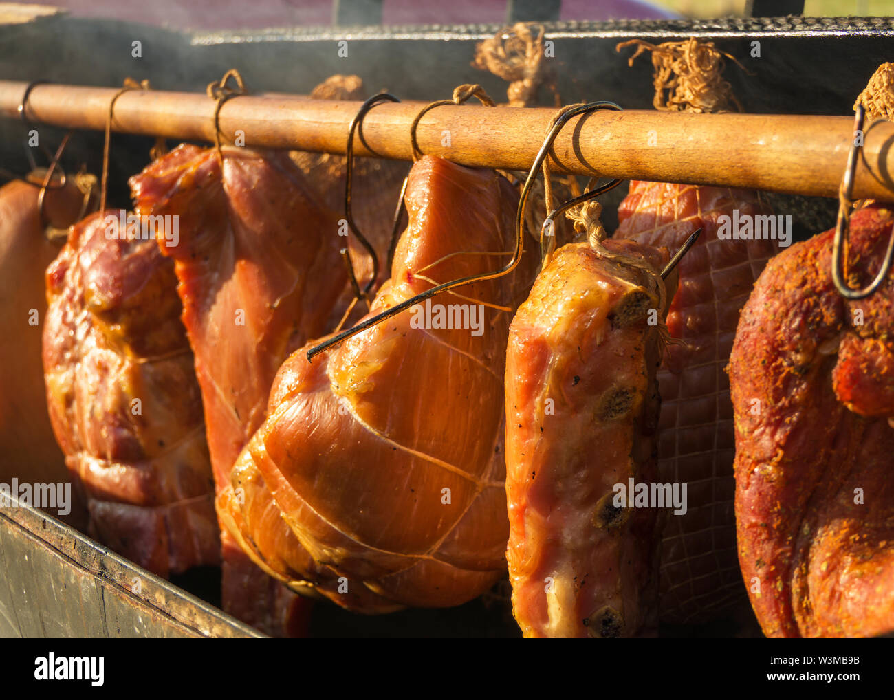 Hanging smoked meat hi-res stock photography and images - Alamy