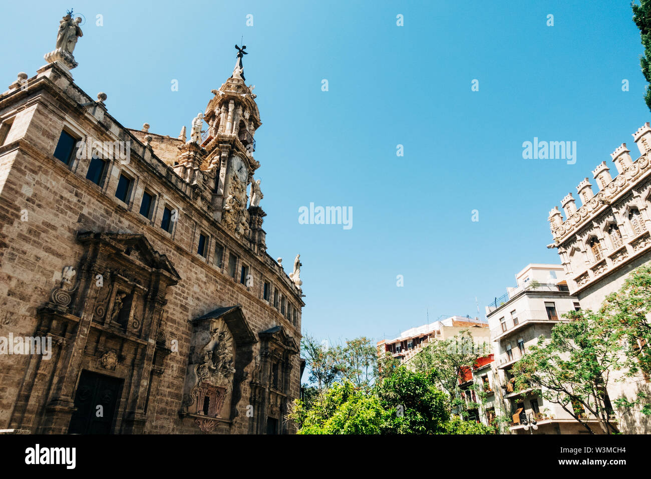 Low angle view of Santos Juanes church in Valencia, Spain Stock Photo ...