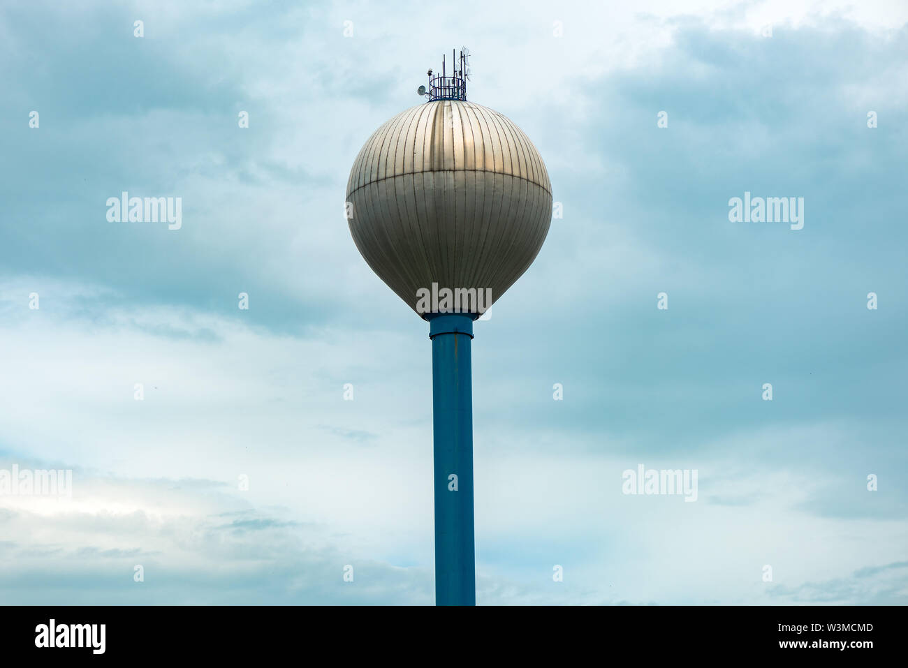 Water tower against overcast sky, typical Central European water tank ...