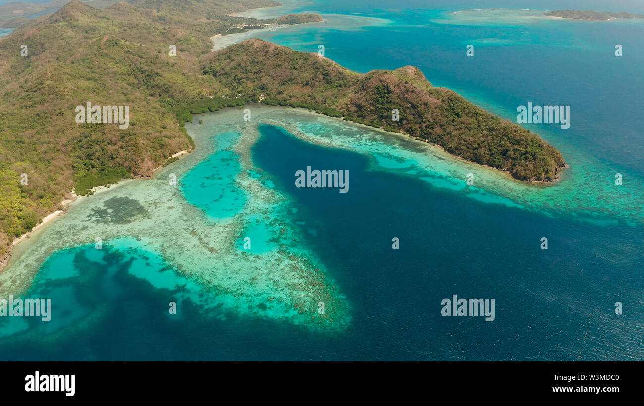aerial drone tropical islands with blue lagoons, coral reef and sandy ...