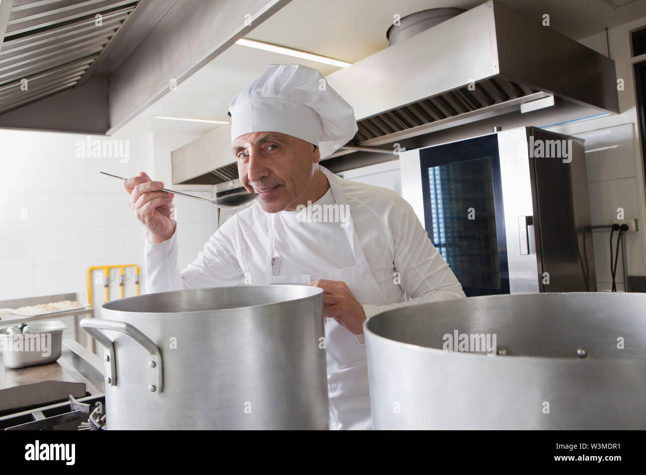 One tasting food kitchen hi-res stock photography and images - Alamy