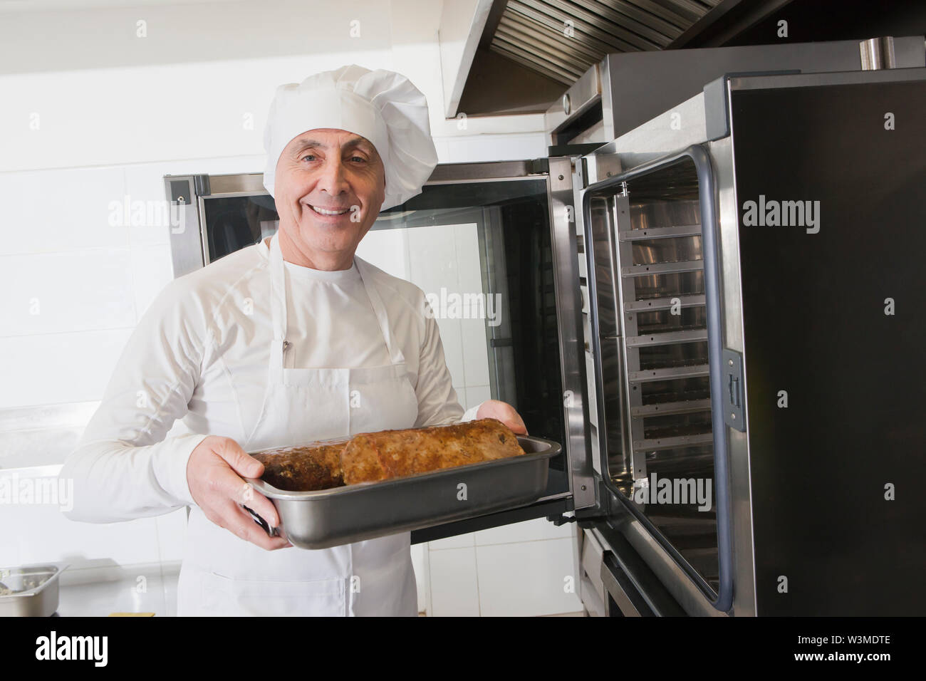 Hispanic man holding tray hi-res stock photography and images - Alamy