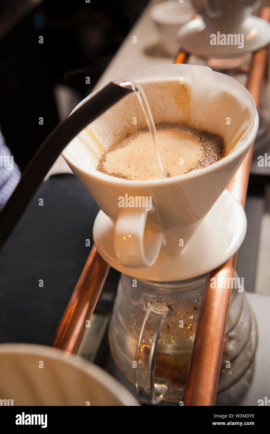 Water being poured into filter coffee Stock Photo - Alamy