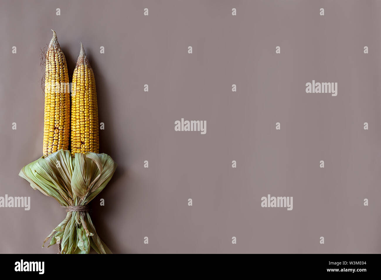 Corn bouquet on craft paper background. Bouquet made with partially ...