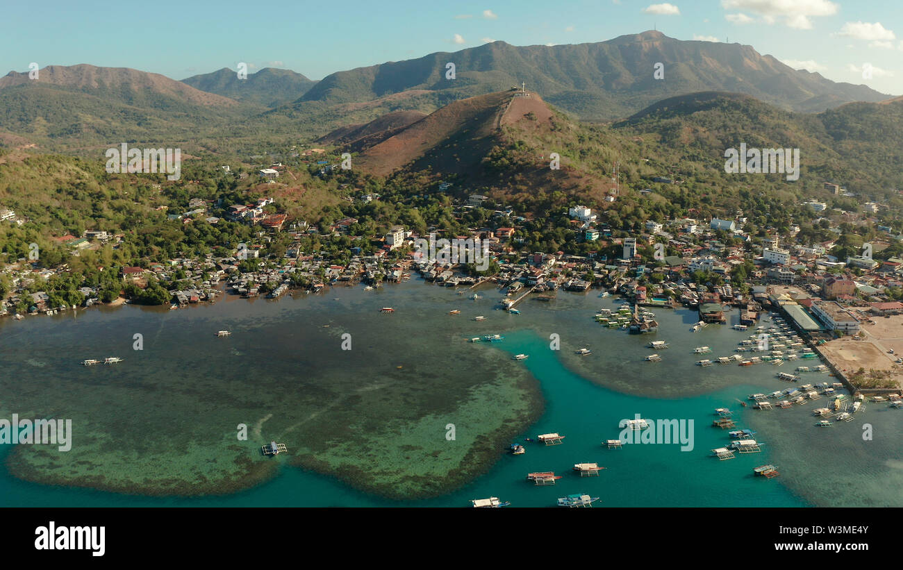sea port, pier, cityscape Coron town with boats on Busuanga island ...
