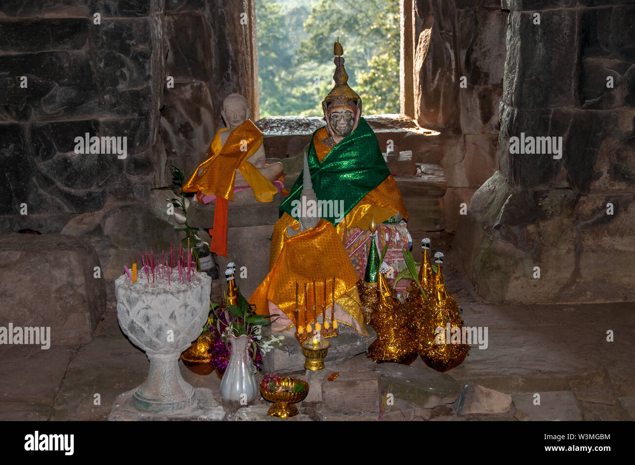 A small Buddhist altar inside a temple at Angkor Wat Stock Photo - Alamy