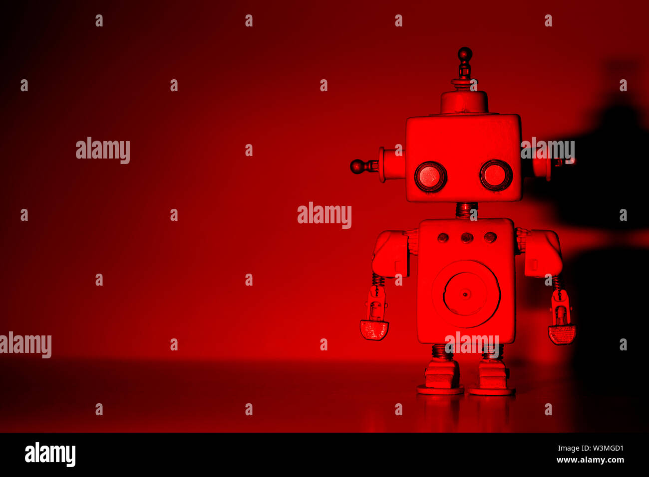 Cute,, handmade robot on a red background with hard shadow Stock Photo ...