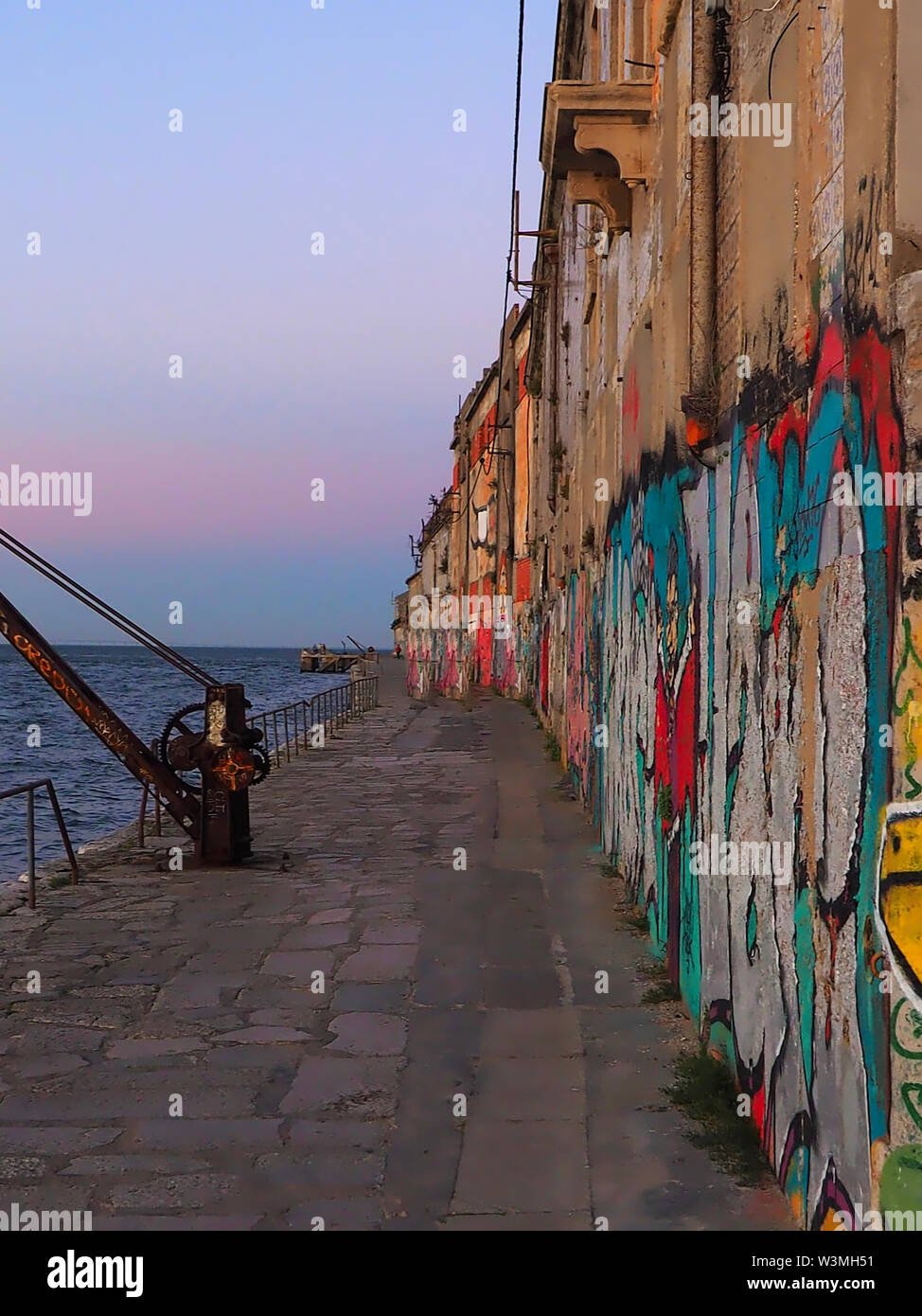 Graffiti at the Tejo riverside in Cascilhas near Lisbon Stock Photo - Alamy