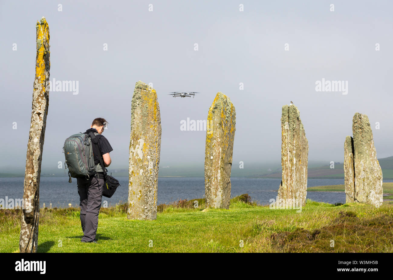 A photographer from a cruise ship flying a drone over the Ring of ...