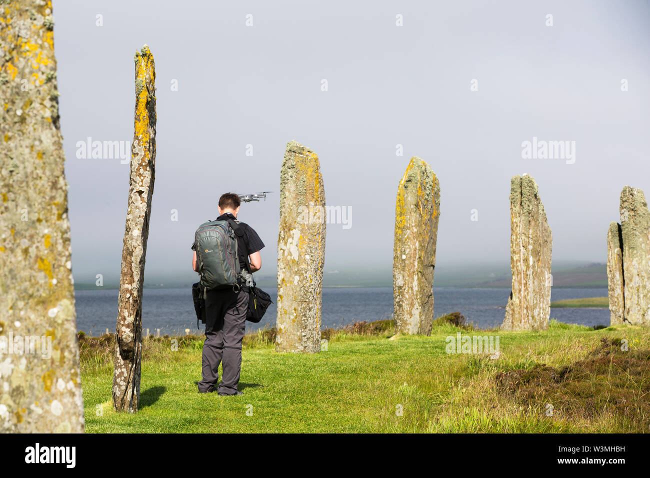 A photographer from a cruise ship flying a drone over the Ring of ...