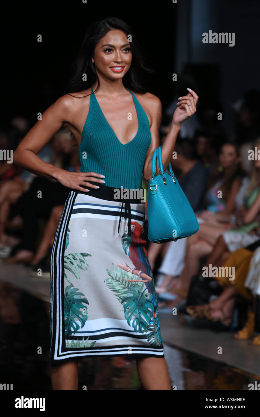 Miami Beach, Florida, USA. 15th Jul 2019. A model walks the runway for ...