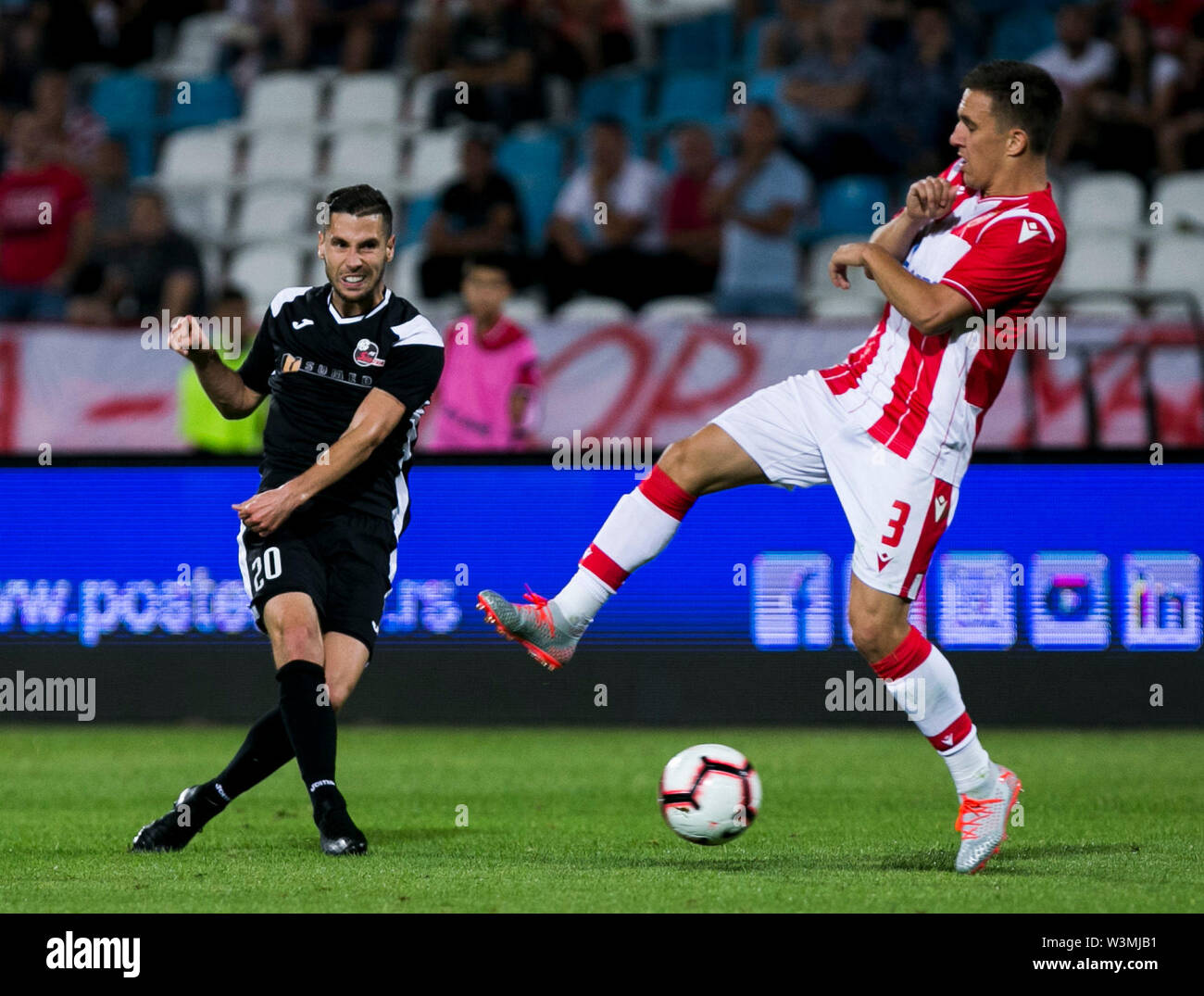 Jovicic of Red Star Belgrade block the shoot of Cadjenovic of Suduva ...