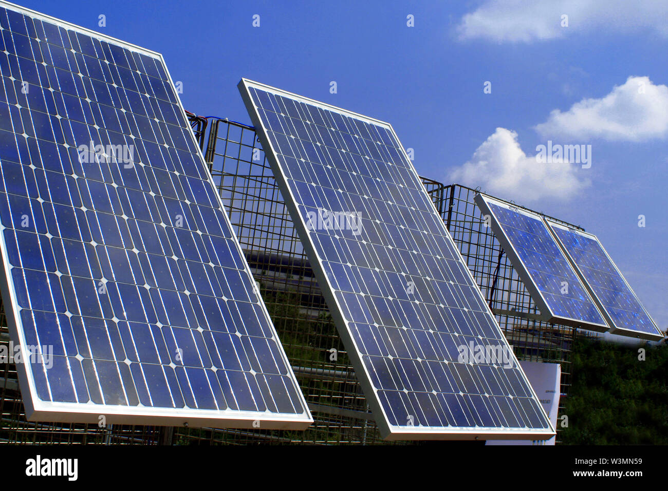 Solar panels for energy production with blue sky on background Stock ...