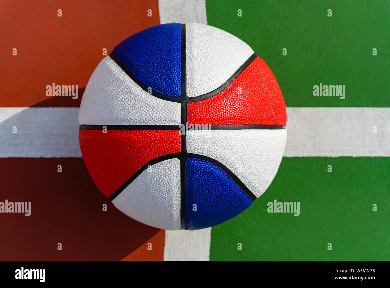 basketball ball on the guide lines of an outdoor stadium symmetric ...