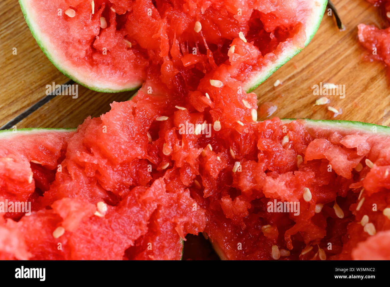 top view smashed watermelon on the ground close up Stock Photo - Alamy