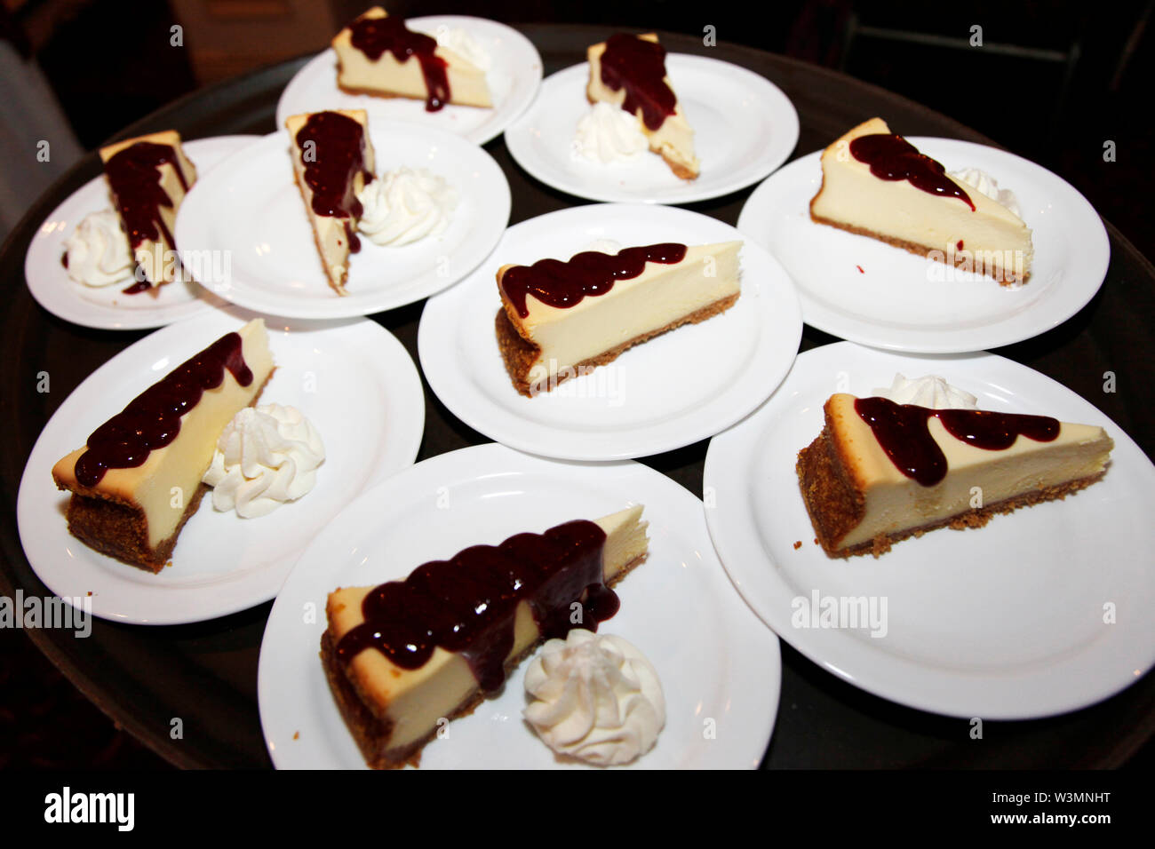 Triangle slices of cheesecake at a party or restaurant with chocolate ...